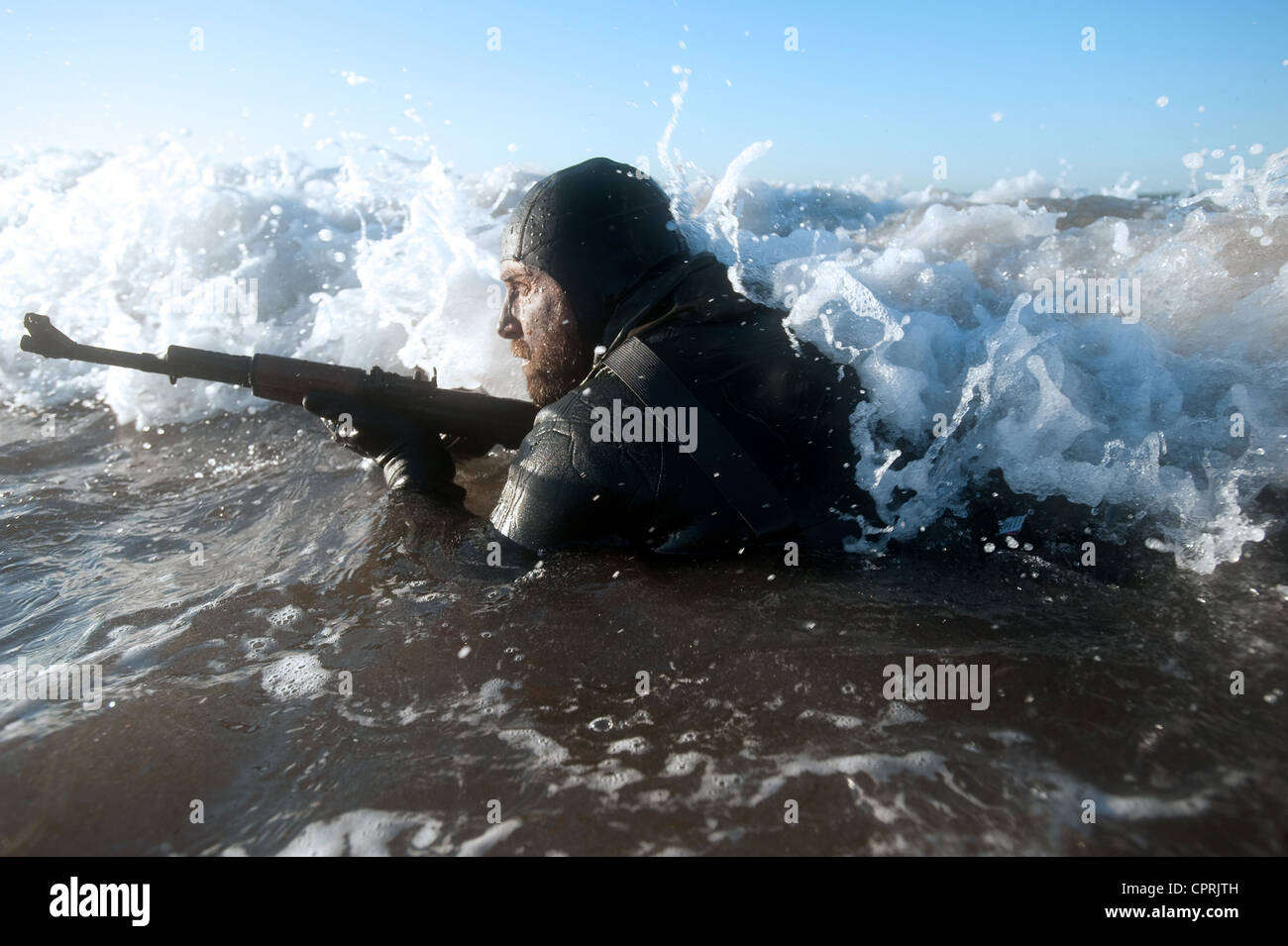 US Navy SEALs during water training at sunrise October 21, 2009 in ...
