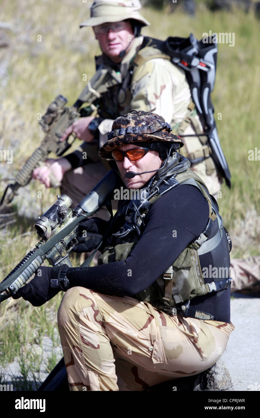 US Navy SEALs practice conduct over the beach marine operations on San ...