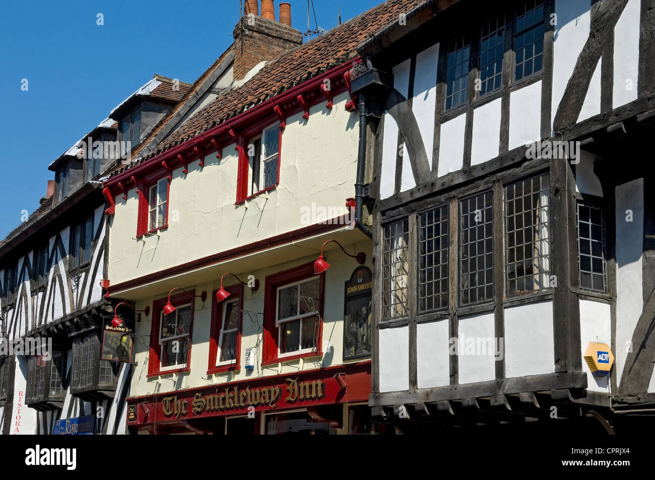 Close up of facades of old building buildings in Goodramgate York North ...