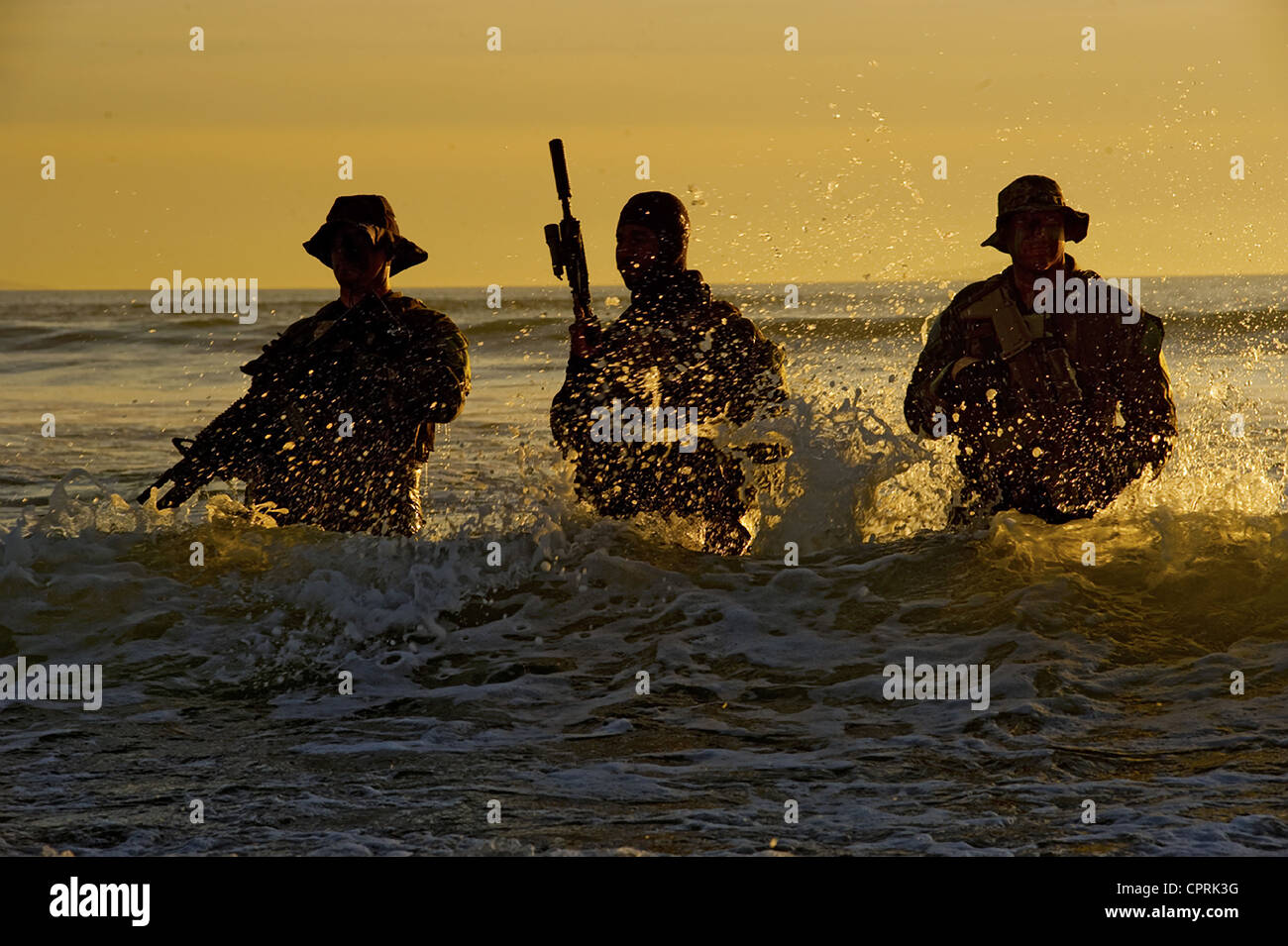 Navy Seals Emerging From Water