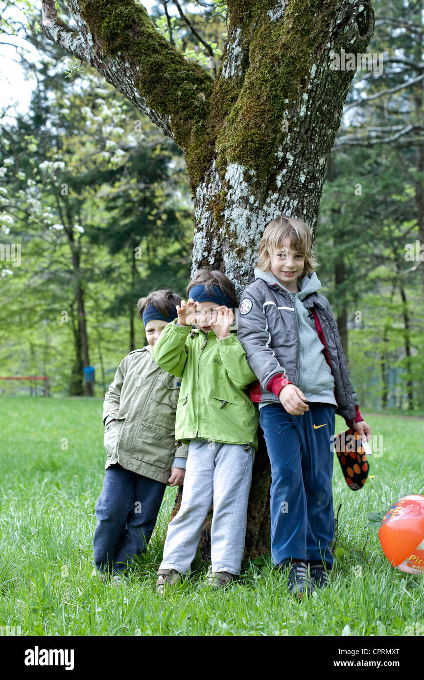 Boys playing outdoor Stock Photo - Alamy