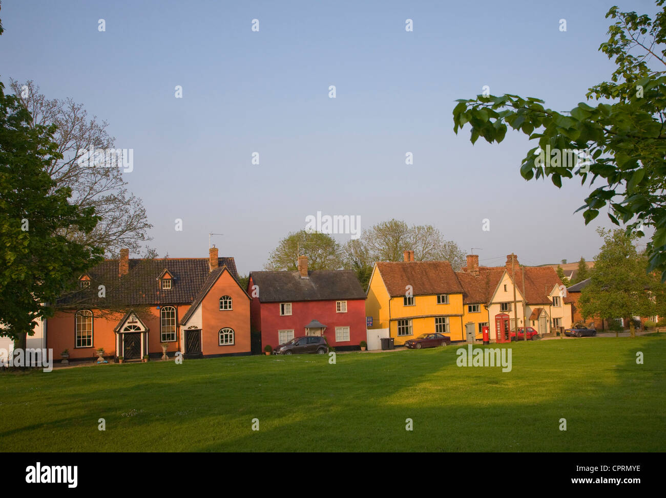 Attractive village houses on the green at late evening, Hartest ...