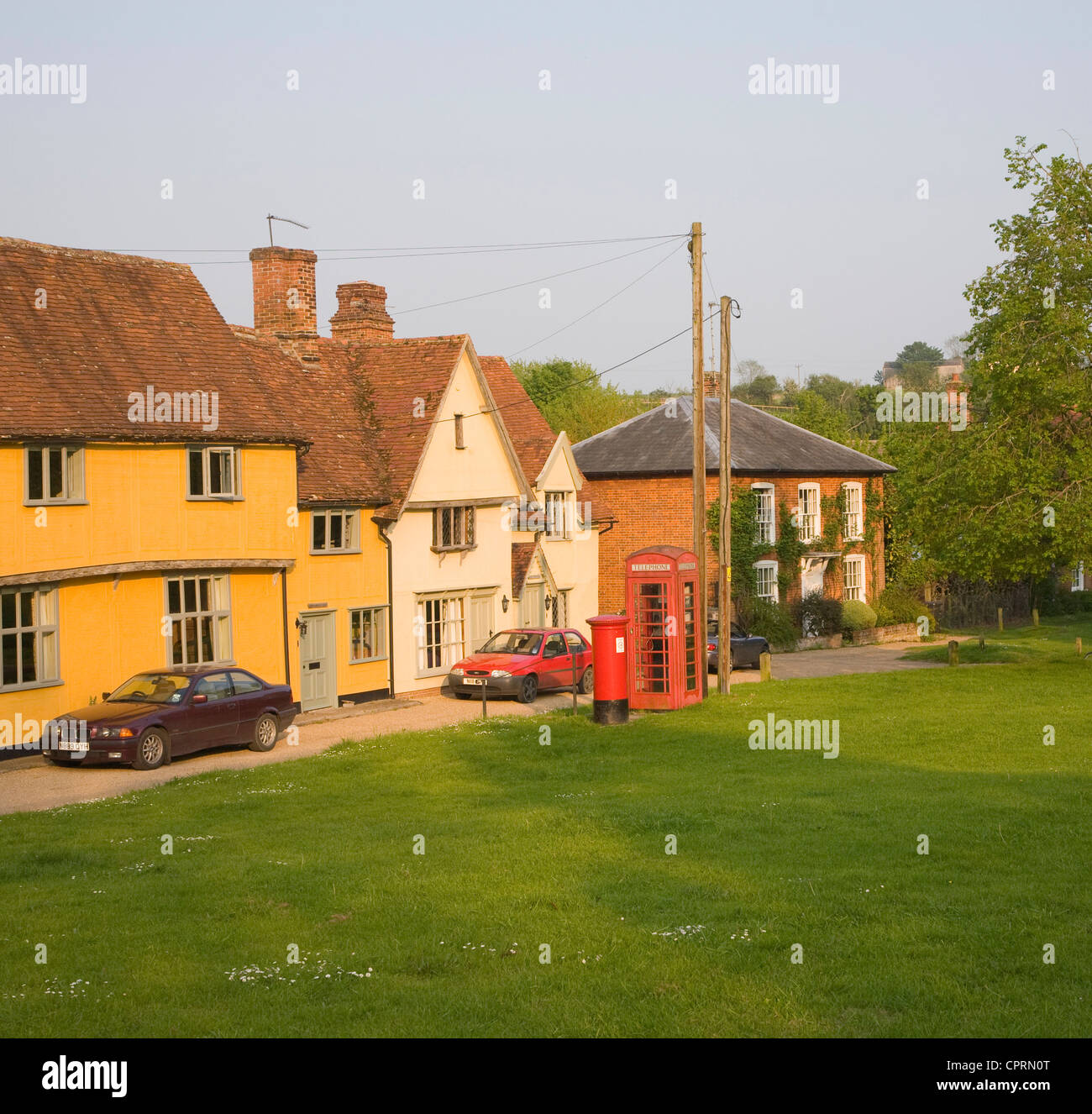 Attractive village houses on the green at late evening, Hartest ...