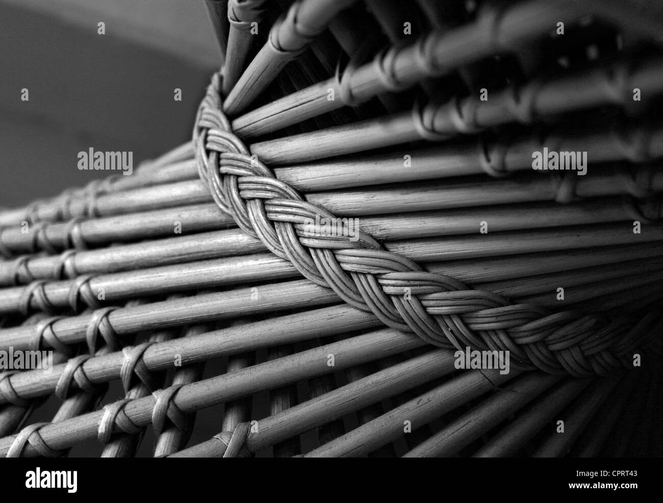 Part of wicker chair with braid element Stock Photo - Alamy