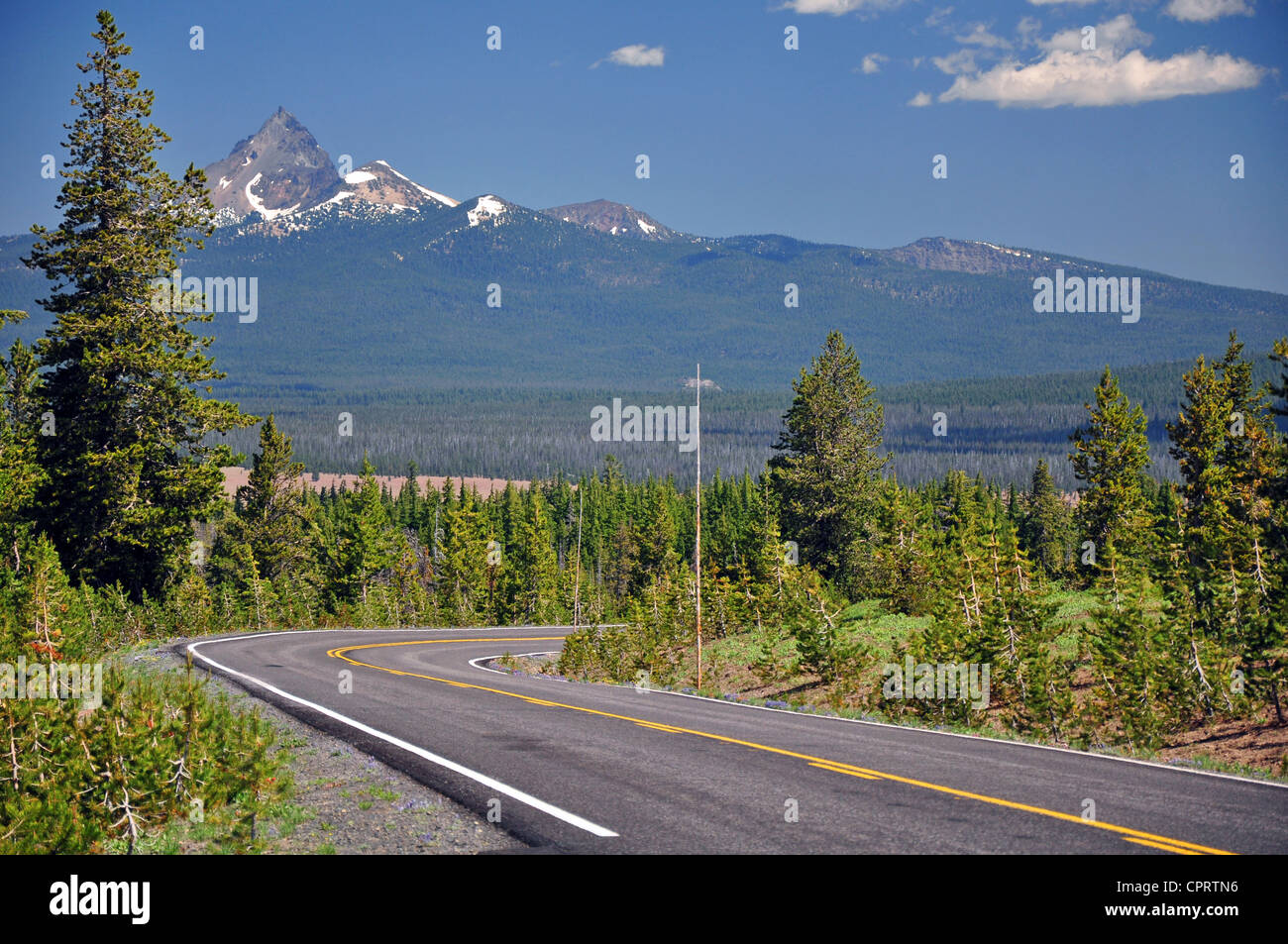 Highway running through the mountains and forest Stock Photo - Alamy