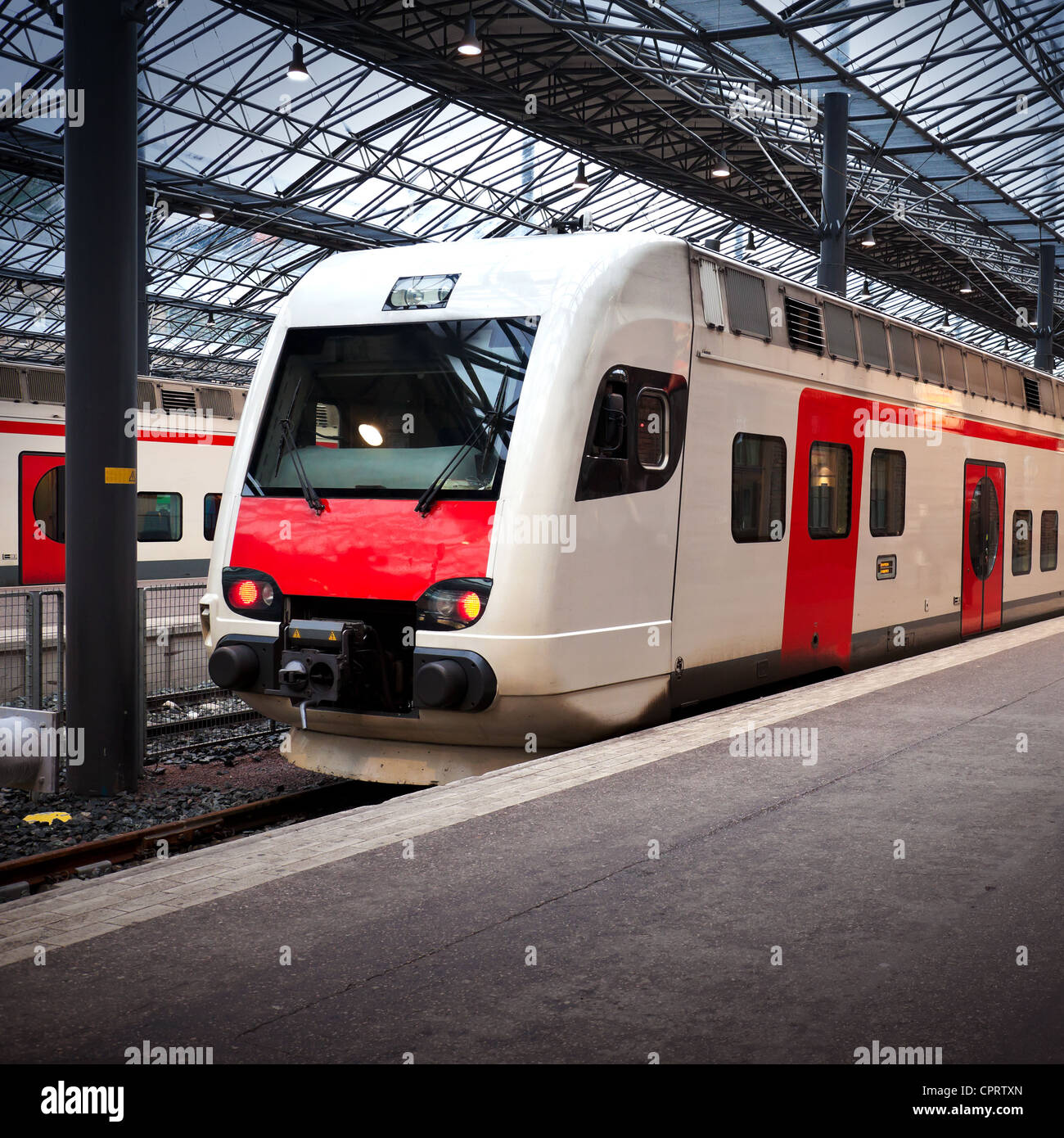 Perspective view of the modern electric express train on a platform ...