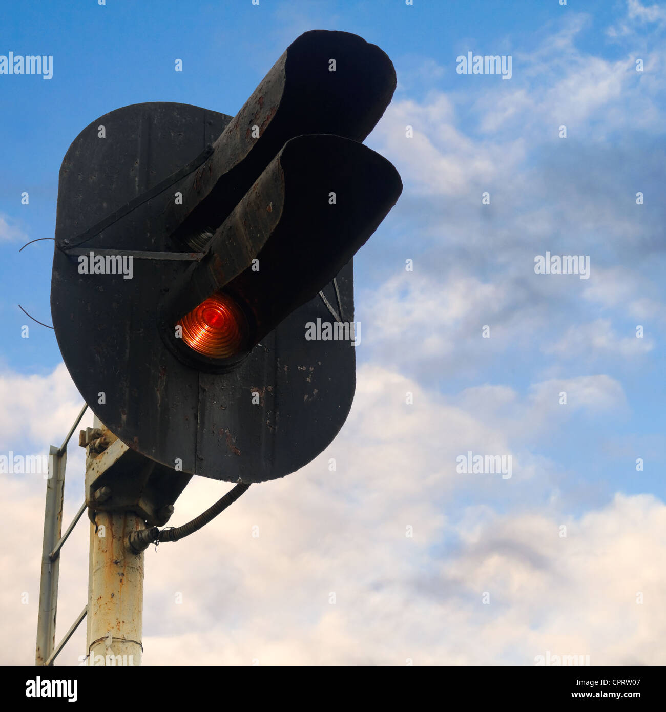 Railroad traffic light with red stop signal Stock Photo - Alamy