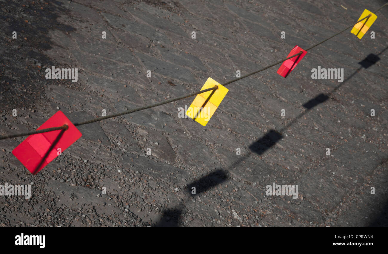 Bright red and yellow labels on the prohibited line Stock Photo - Alamy