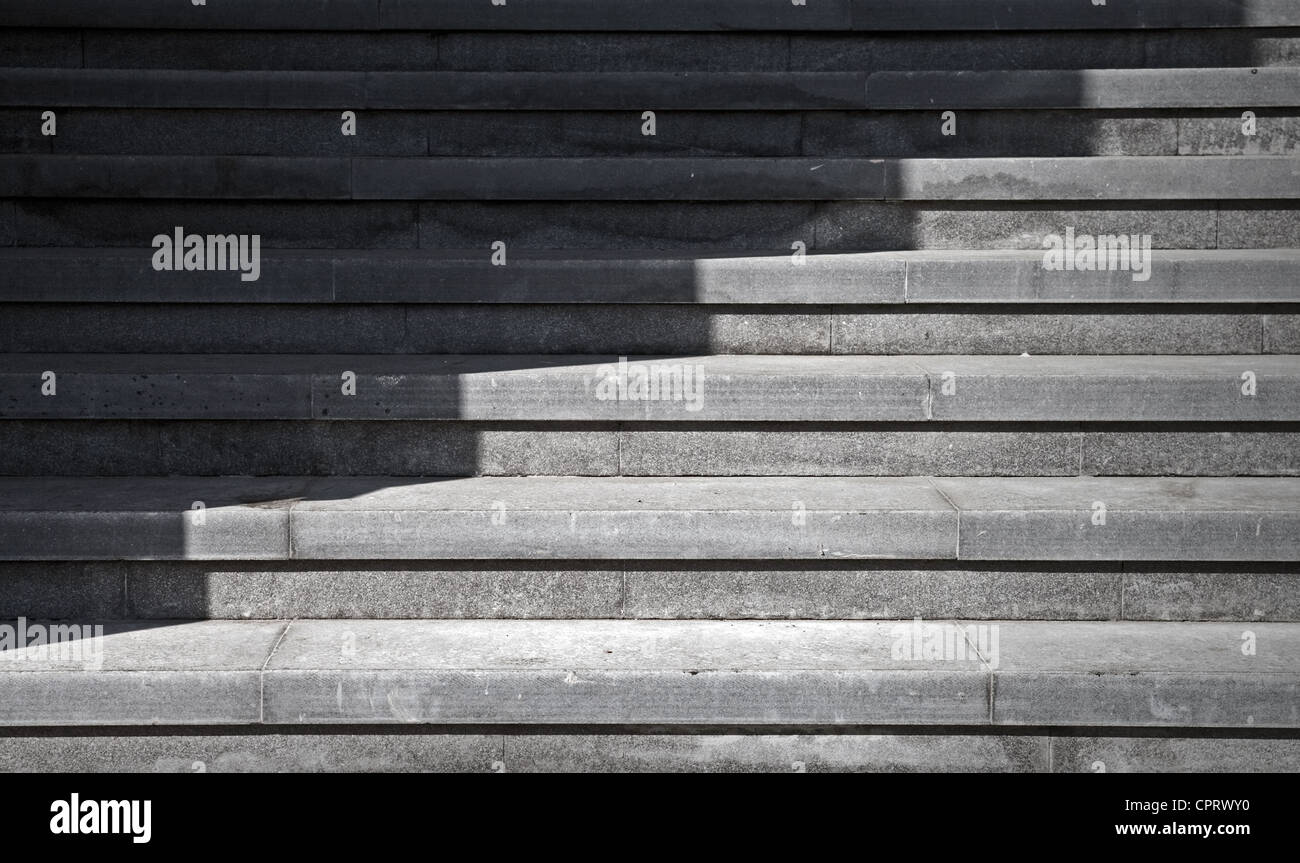 Seven footstep with shadow walking across Stock Photo - Alamy
