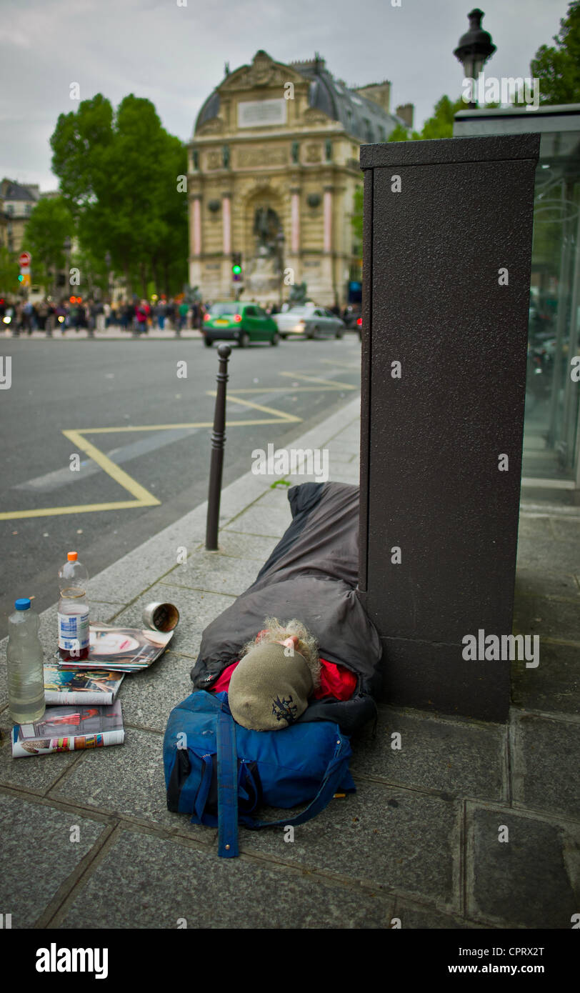 Urban poverty, Blue, white red, a homeless place Saint Michel Stock ...