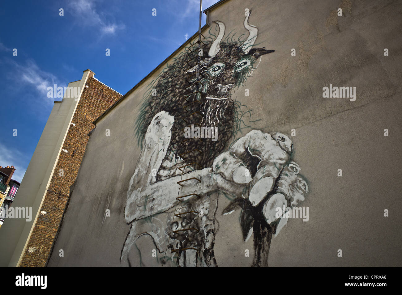 the Beast, Graffiti representing the Beast, on the facade of a Parisian ...