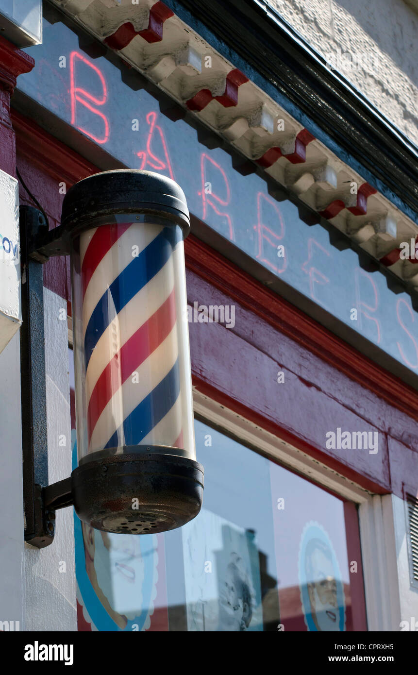Motorised rotating barbershop pole sign in the centre of Edinburgh ...