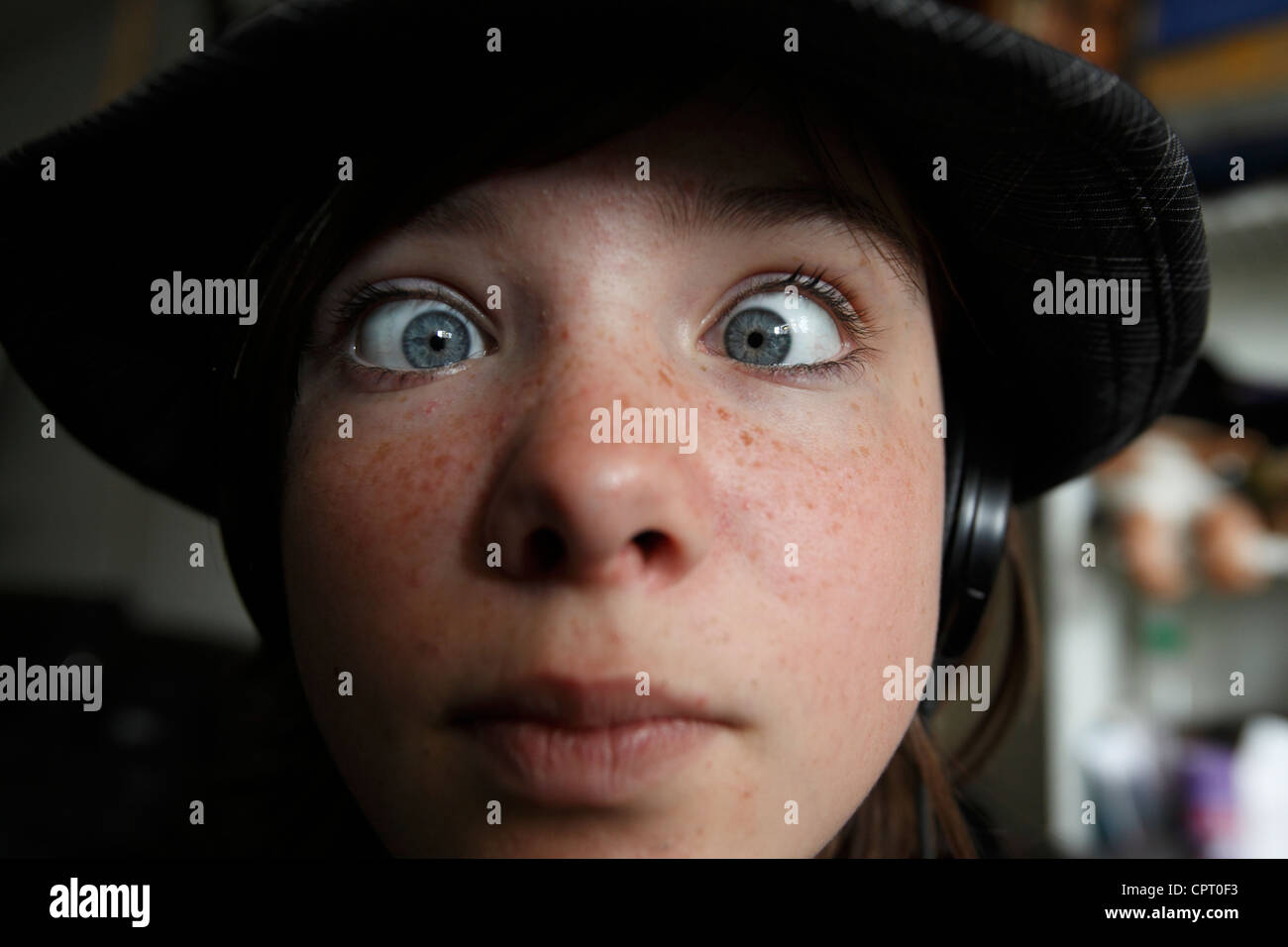 Girl with crossed eyes Stock Photo - Alamy