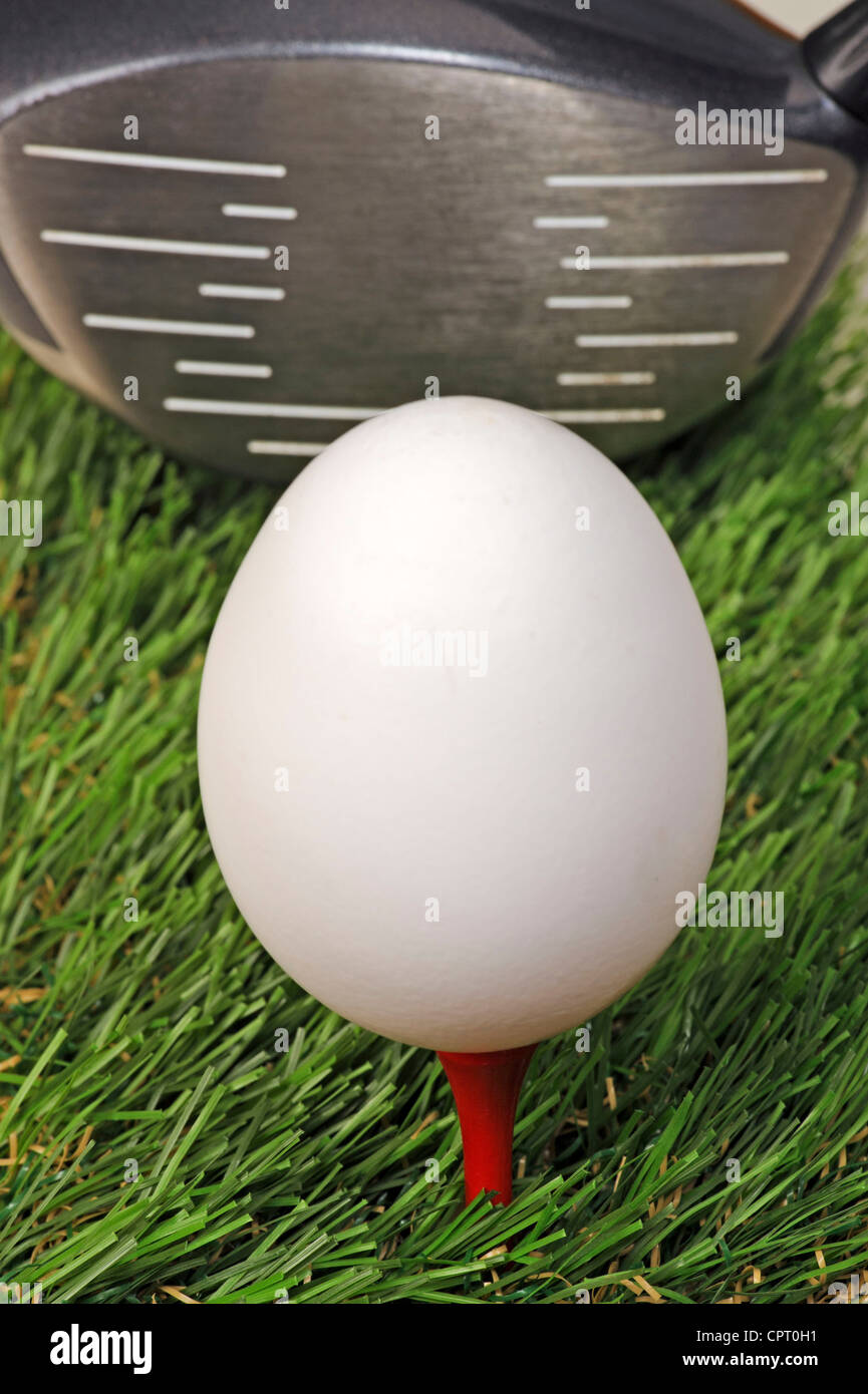 Egg on a golf tee hi-res stock photography and images - Alamy
