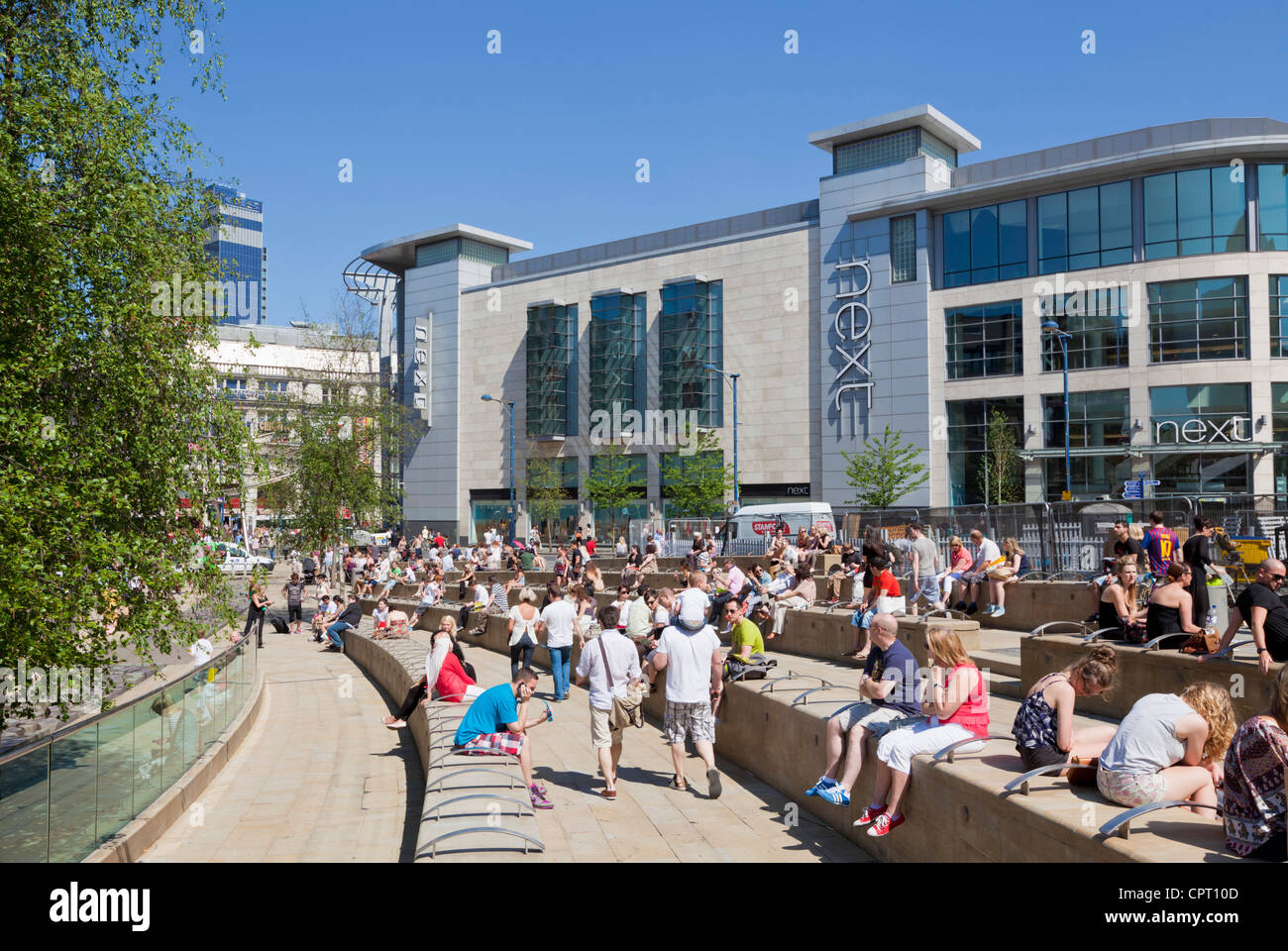 Crowds of shoppers outside Next store at the Arndale centre Manchester ...