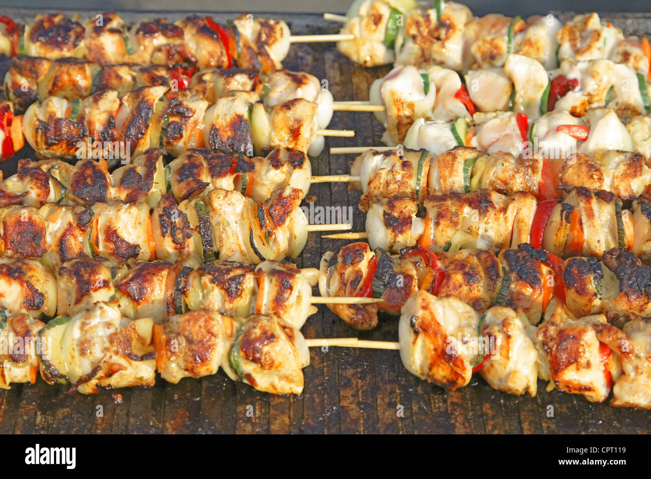 Close-up image of tasty skewer on a grill Stock Photo - Alamy