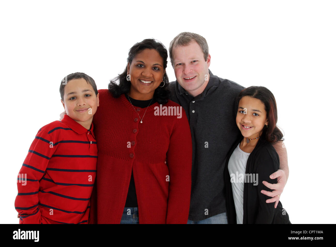 Family of four posing on white background Stock Photo - Alamy