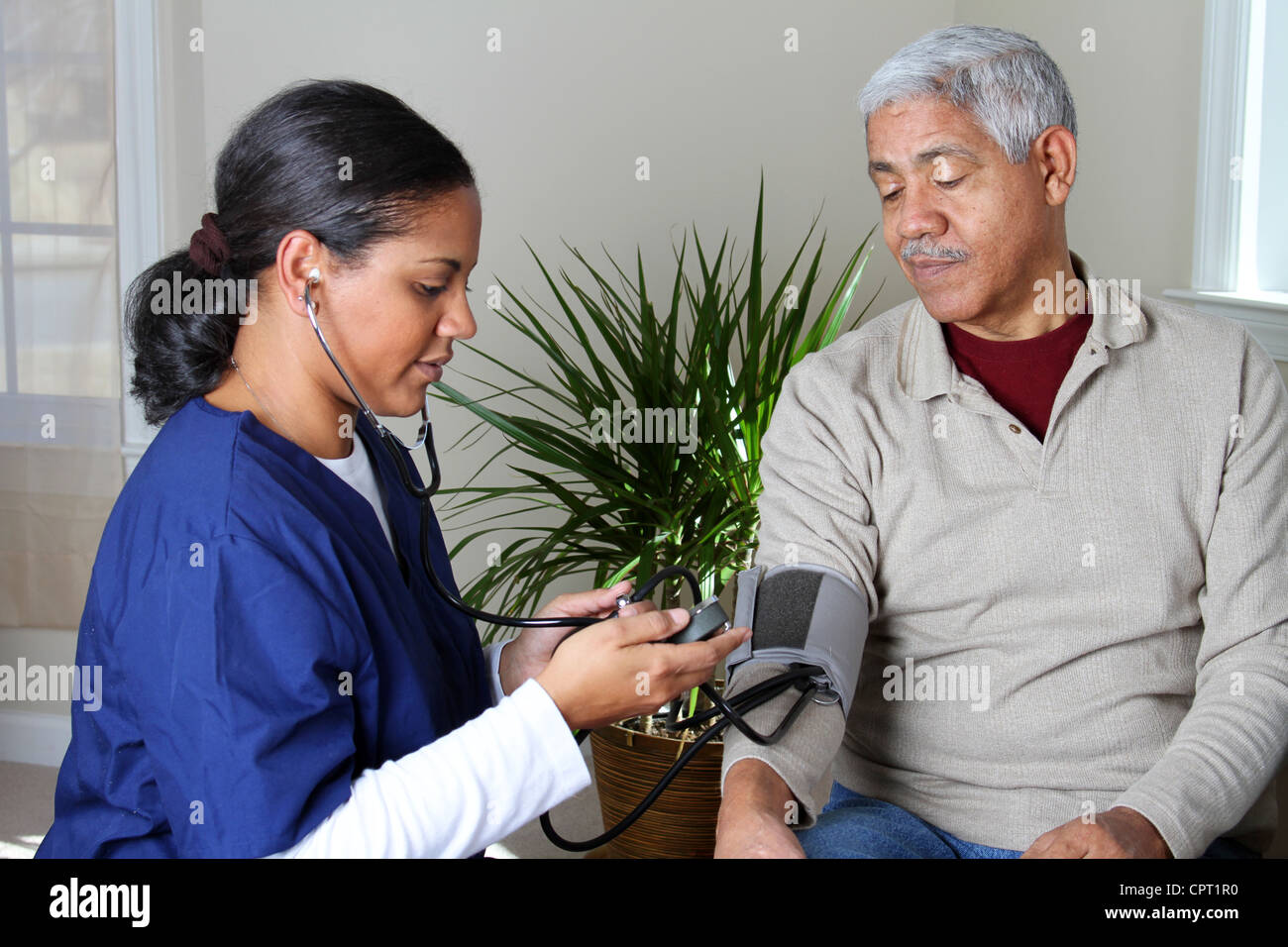Home health care worker and an elderly man Stock Photo - Alamy