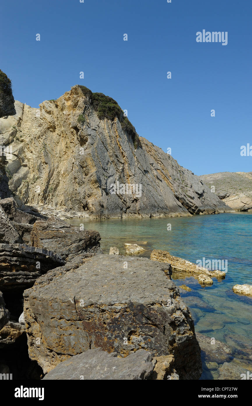 Cliffs and rocks by the beach area of arenal d'en castell menorca spain ...