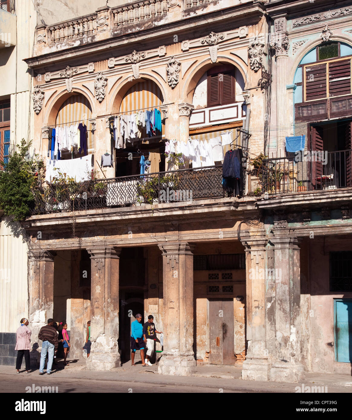 Old colonial building with Cuban people in Old Havana Cuba Stock Photo ...