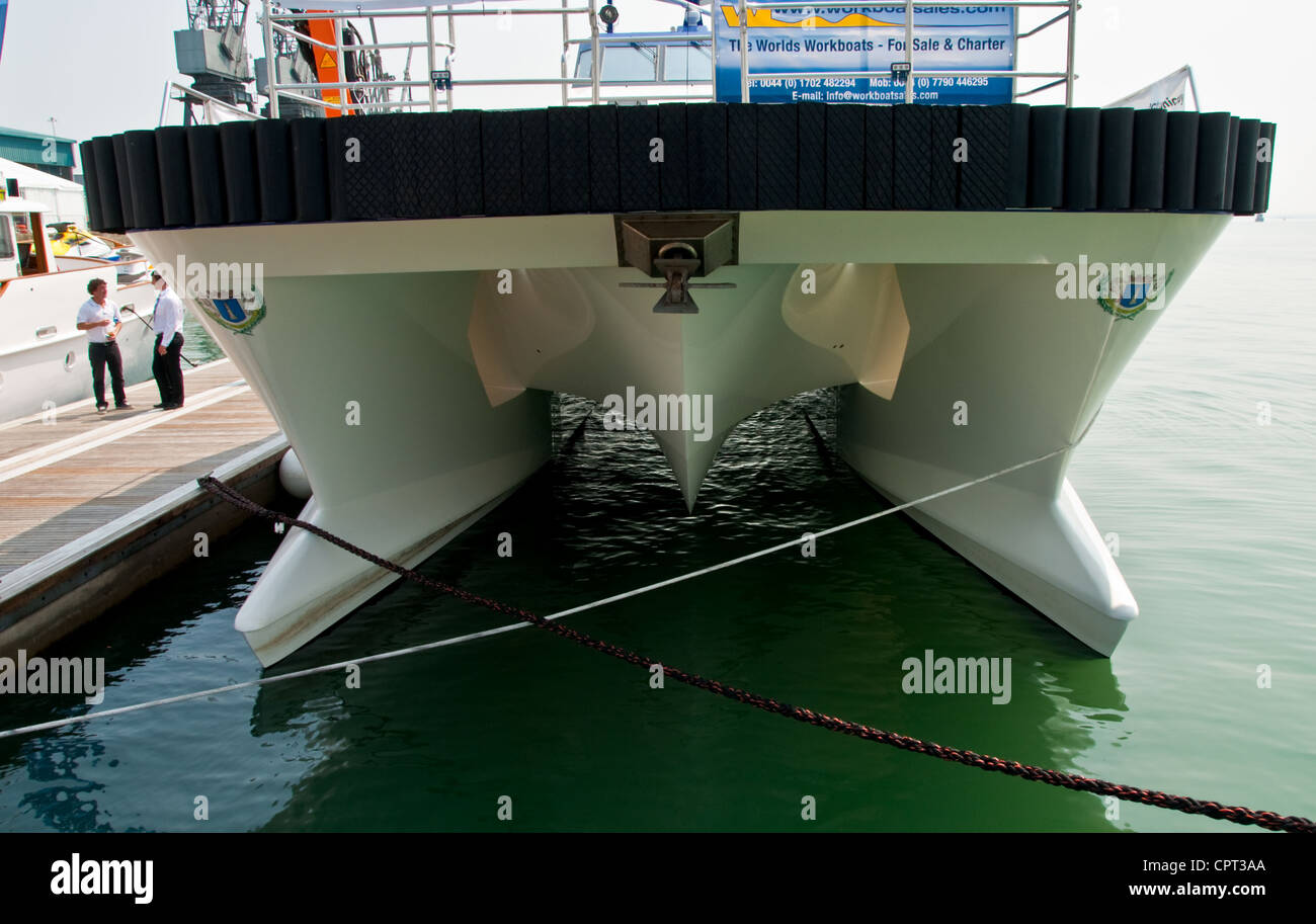 The bow and underside of a trimaran afloat in dock Stock Photo - Alamy