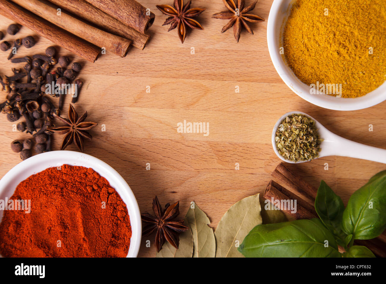 Frame composition of spices on wood, anise,cinnamon,pepper, laurel ...