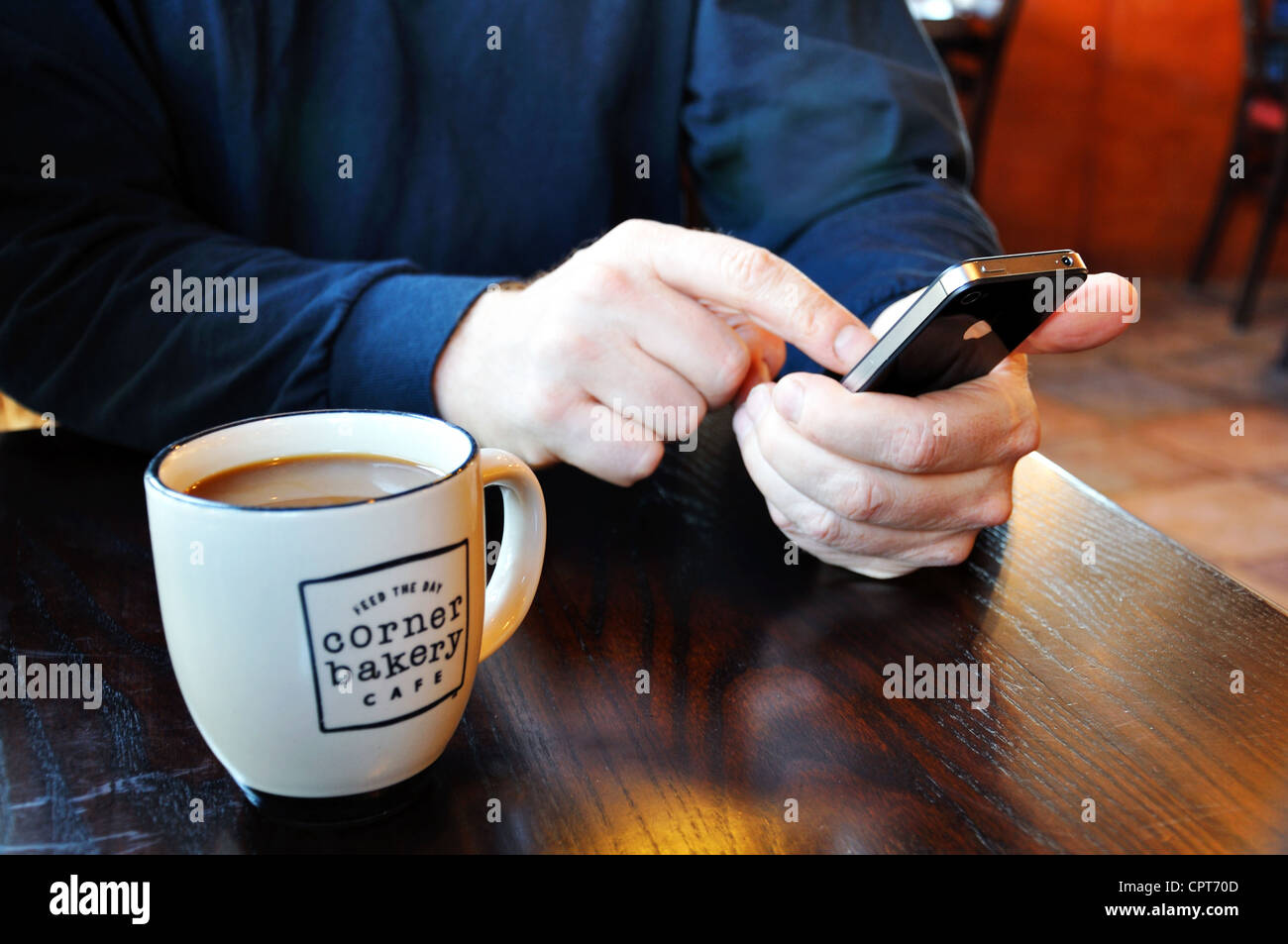 Texting with iPhone Stock Photo - Alamy