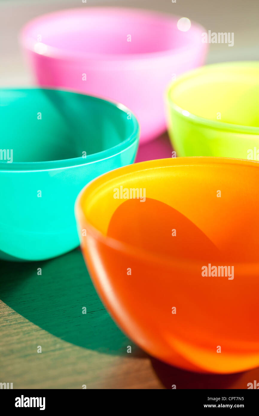 Four colorful empty bowls with bright colors Stock Photo - Alamy