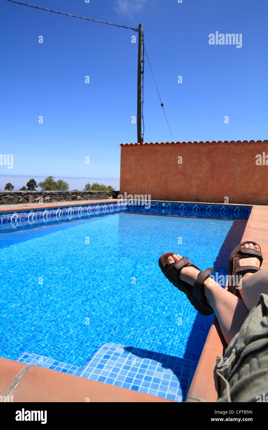 Relaxing at swimming pool Stock Photo - Alamy