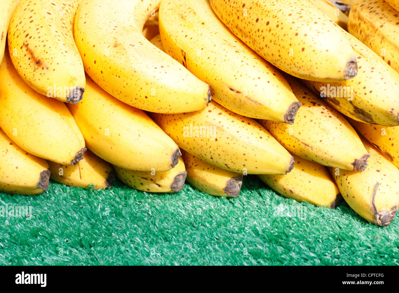 Loads of yellow bananas in a horizontal composition Stock Photo - Alamy