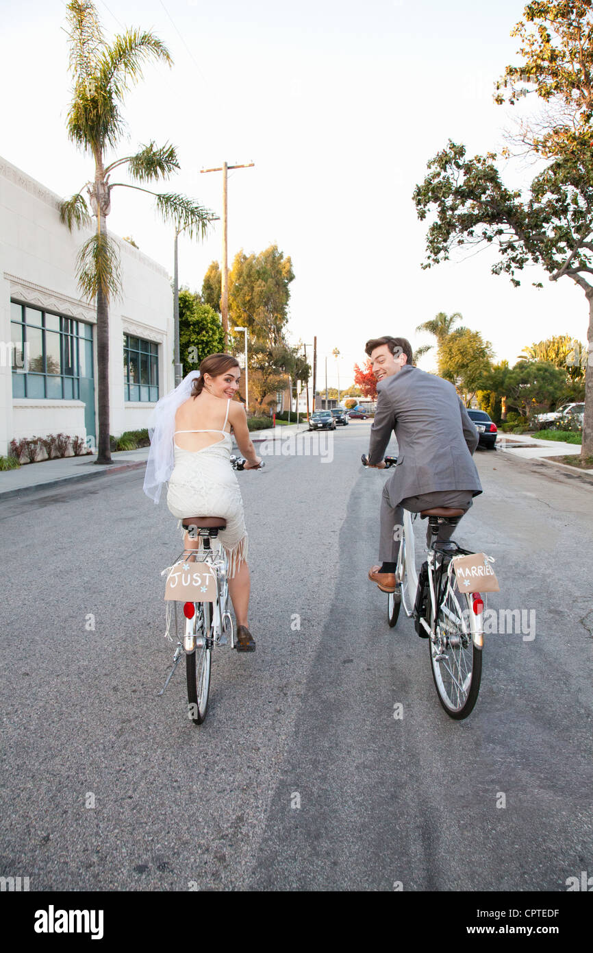 Marriage honeymoon couple bicycle hi-res stock photography and images ...