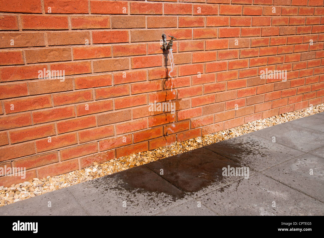 Outdoor tap with running water Stock Photo - Alamy