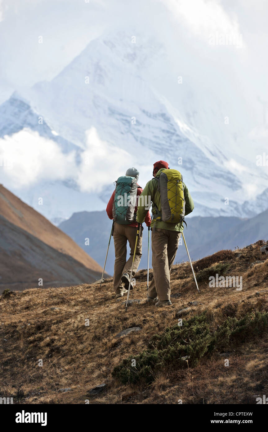 Female trekker following trail hi-res stock photography and images - Alamy