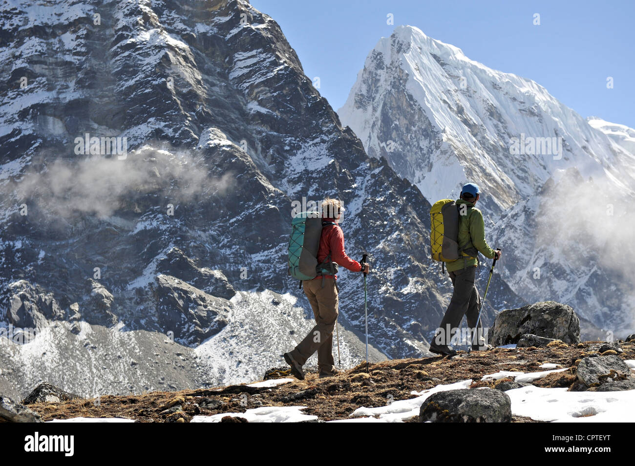 Trekkers hiking along a ridge, Gokyo, Nepal Stock Photo - Alamy