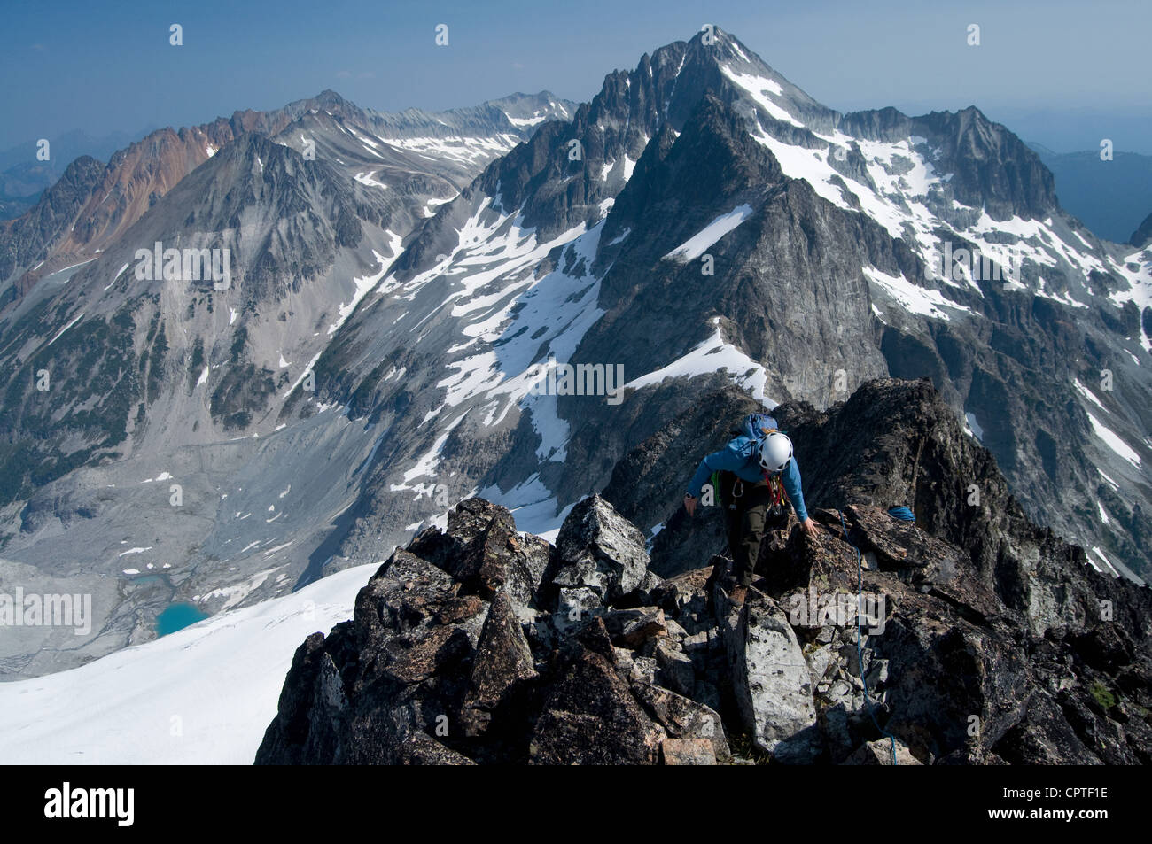 Female climber on mountain summit, Redoubt Whatcom Traverse, North ...