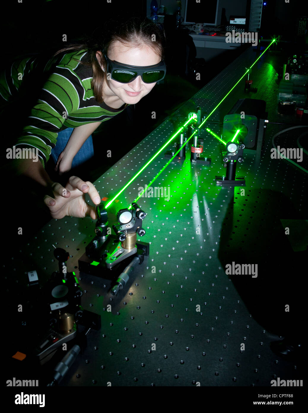 female scientist doing research in a quantum optics lab Stock Photo - Alamy