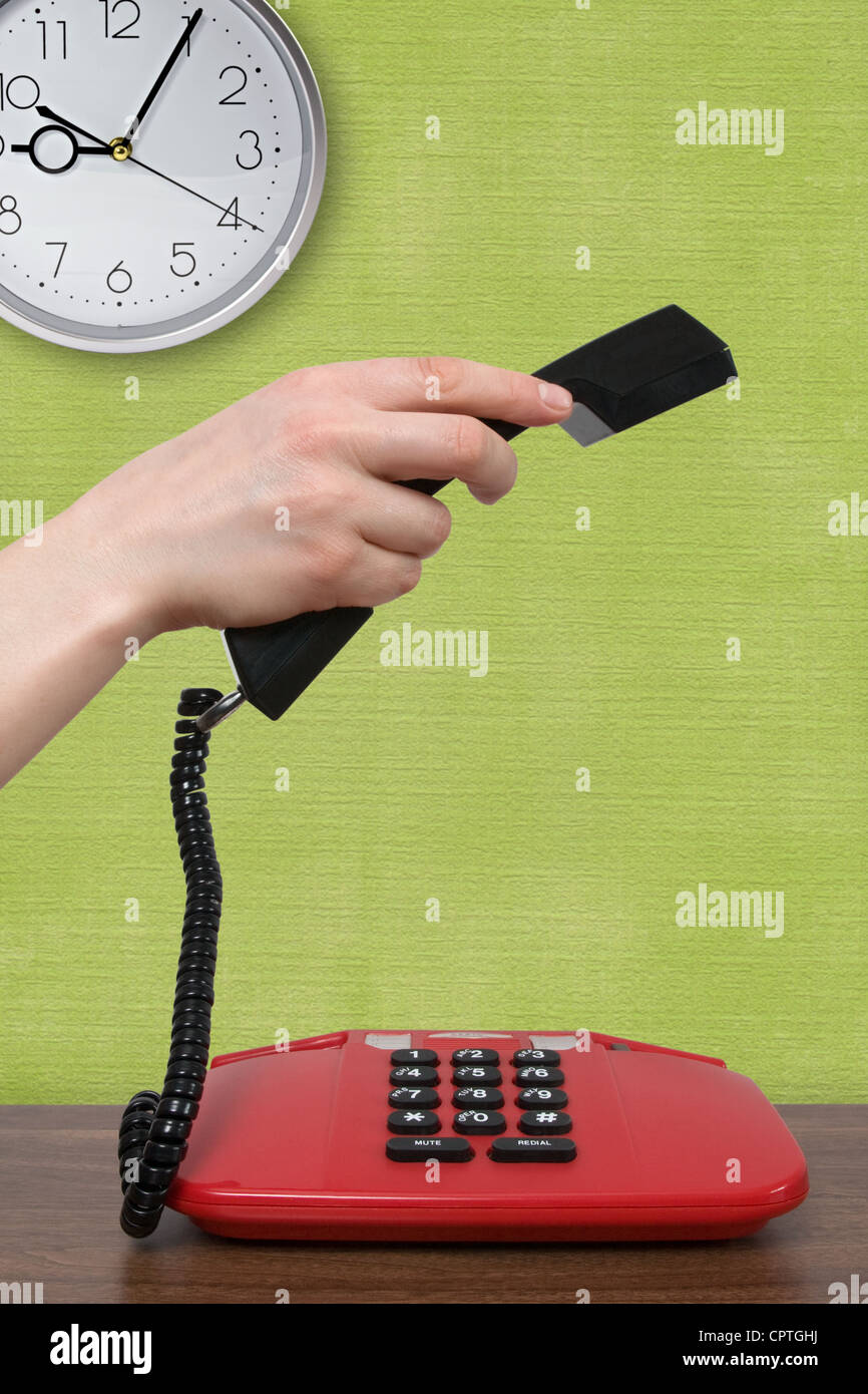 making a phone call at nine o'clock in morning Stock Photo - Alamy