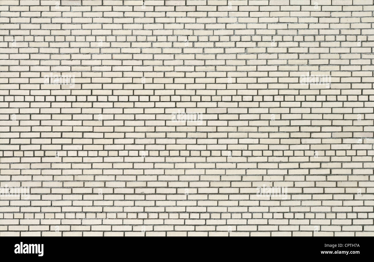 Small-scale gray brick wall background texture Stock Photo - Alamy