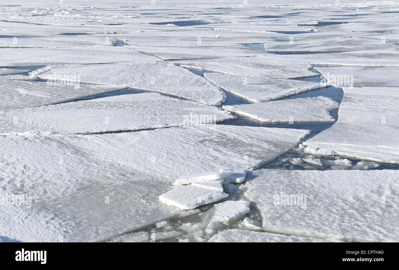 Blocks of ice on frozen lake. Background texture Stock Photo - Alamy