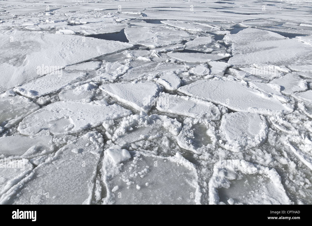 Blocks of ice on frozen lake. Background texture Stock Photo - Alamy