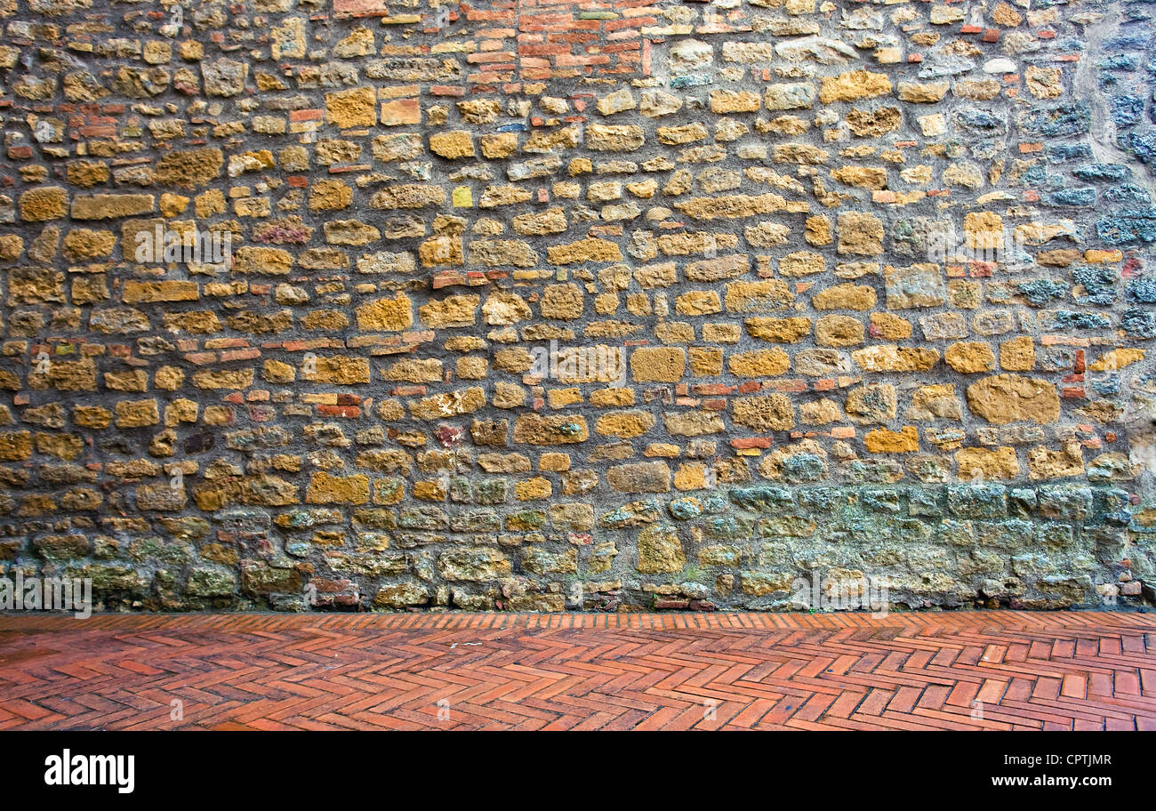 The old stone wall after rain. Italy, Tuscany Stock Photo - Alamy