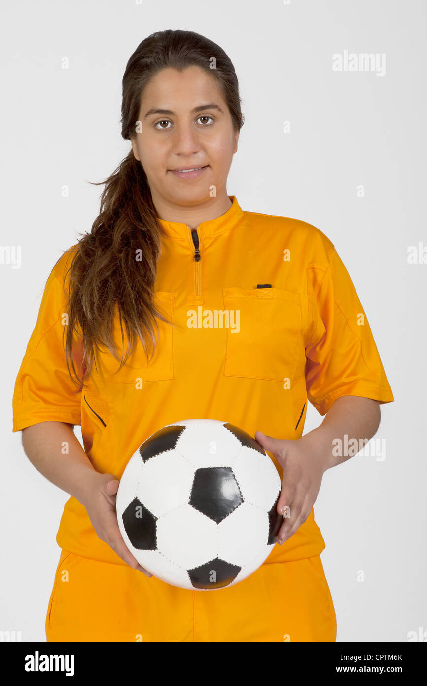 female referee with a soccer ball Stock Photo - Alamy