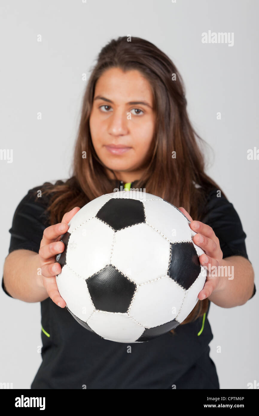 female referee with a soccer ball Stock Photo - Alamy