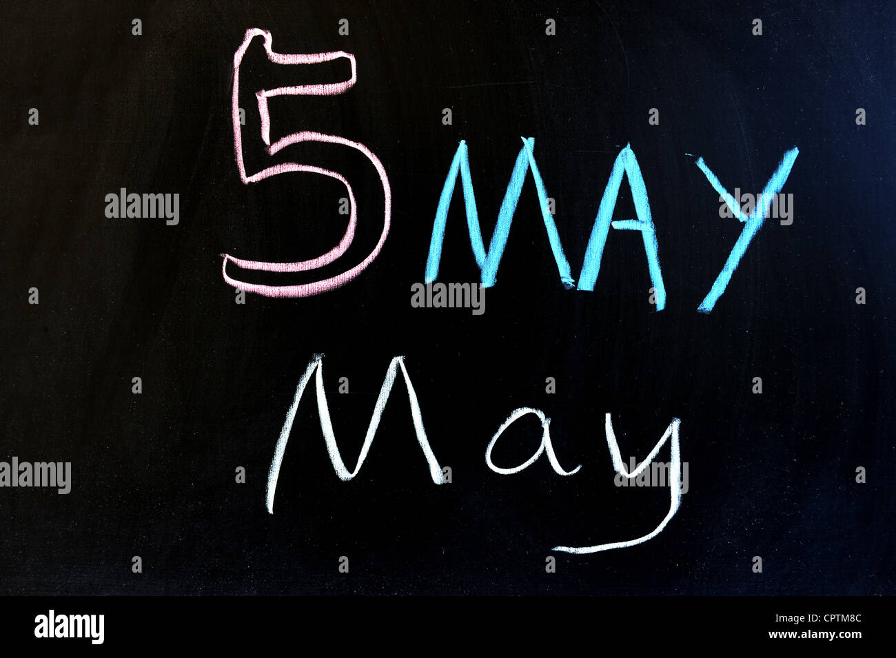 Chalk drawing - May words written on chalkboard Stock Photo - Alamy