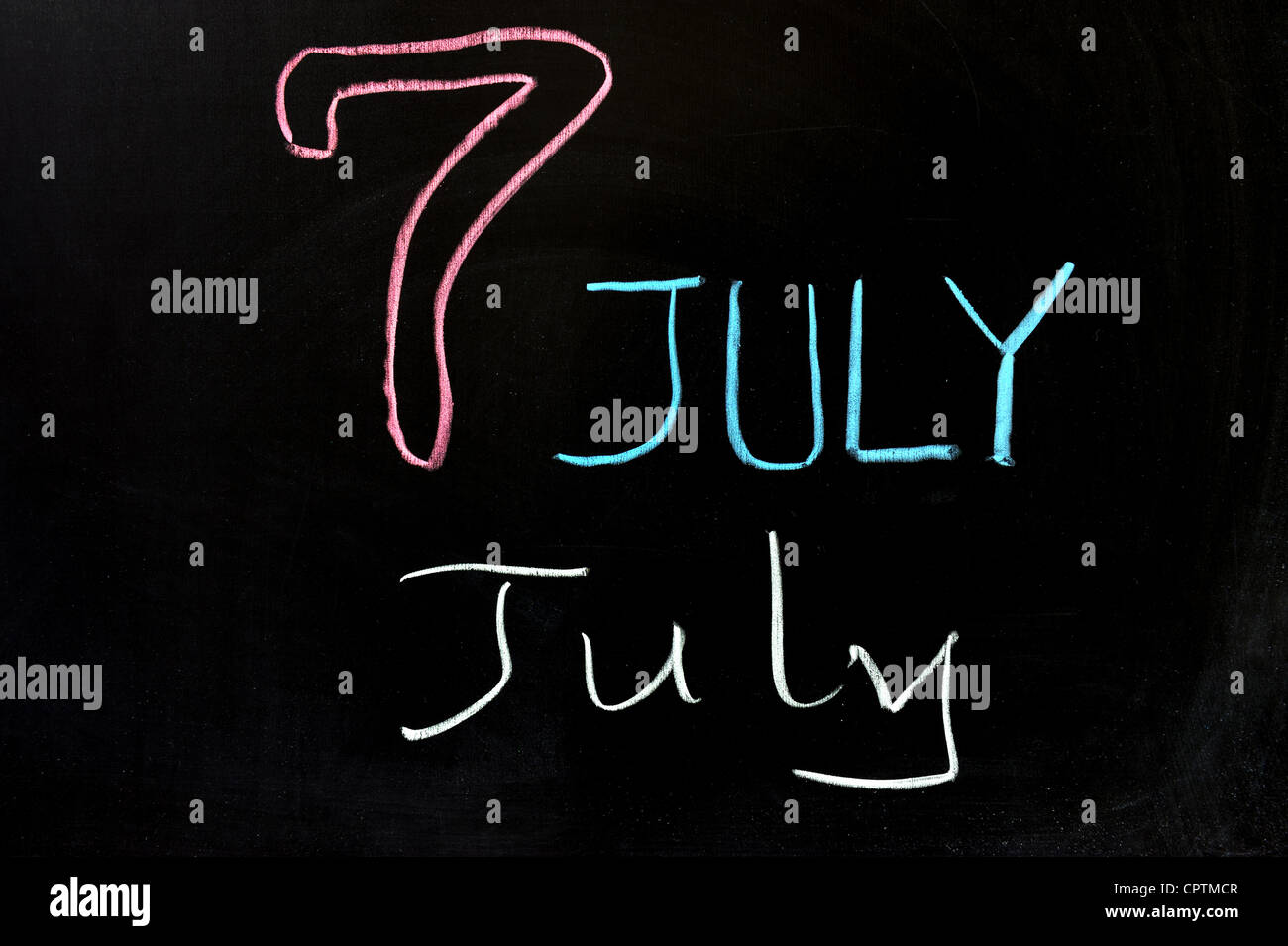 Chalk drawing - July words written on chalkboard Stock Photo - Alamy