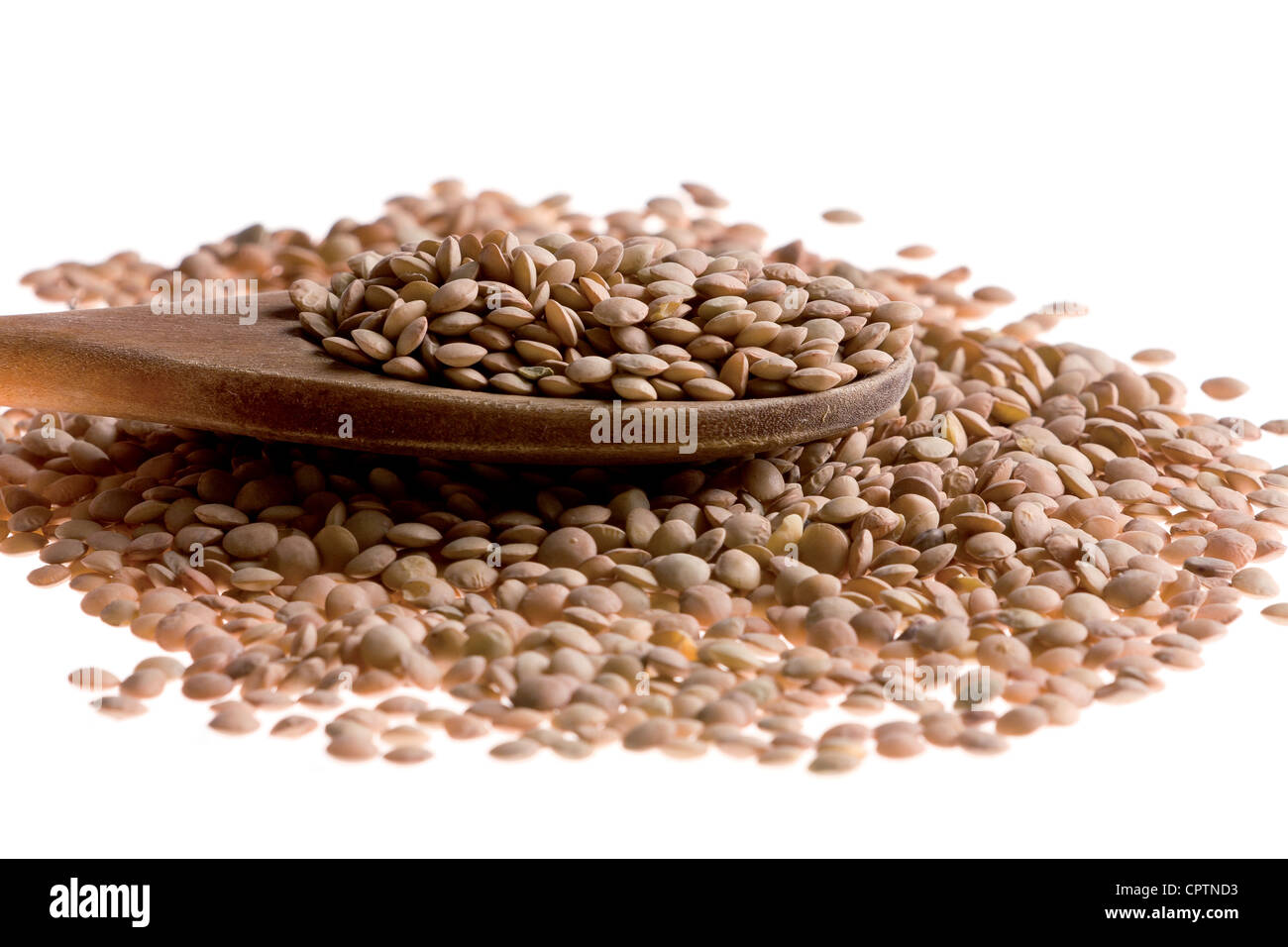 Lentils on white background Stock Photo - Alamy