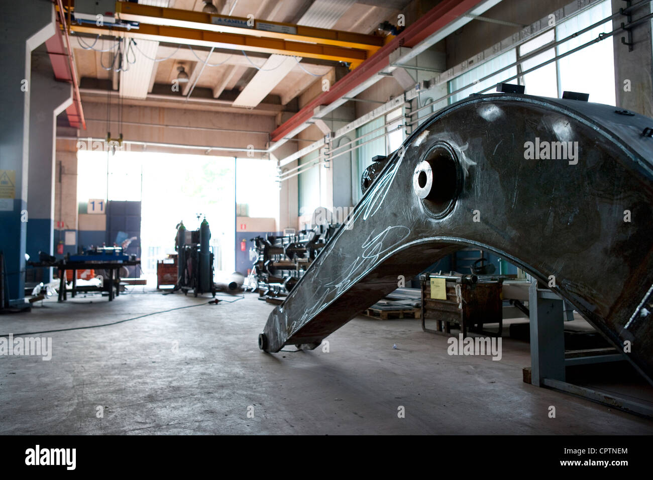 Machining a mechanical arm in Metal Industry Stock Photo - Alamy
