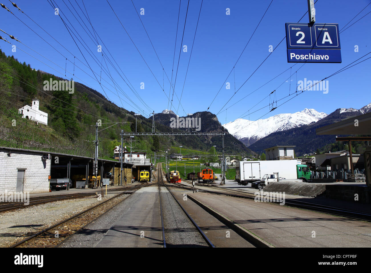 Poschiavo train station with the swiss Alps in the distance Switzerland ...