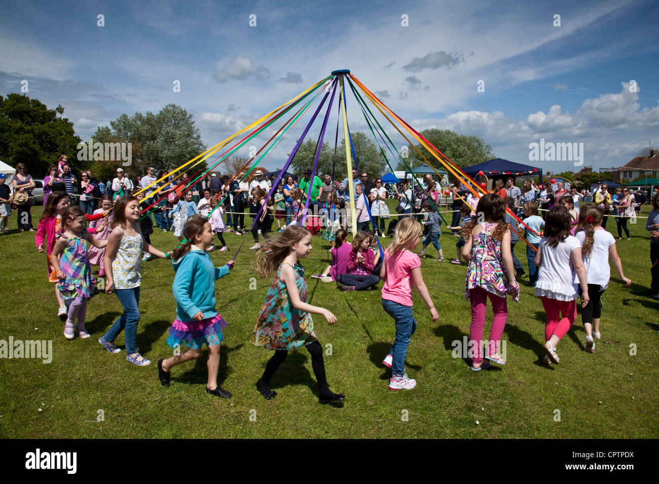May day children dancing around maypole hi-res stock photography and ...