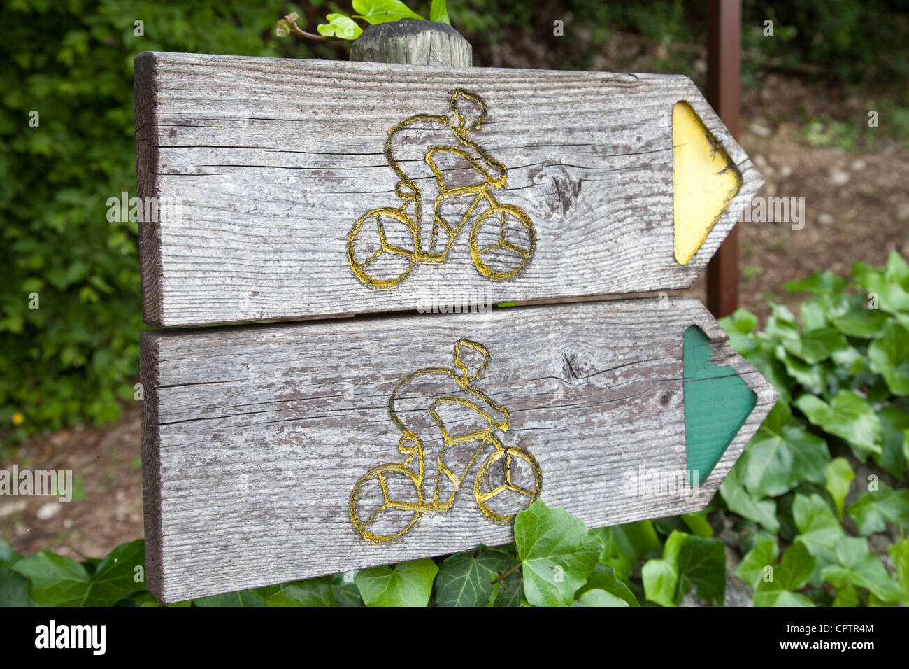 A bike trail sign in the woods Malcesine Lake Garda Italy Stock Photo ...